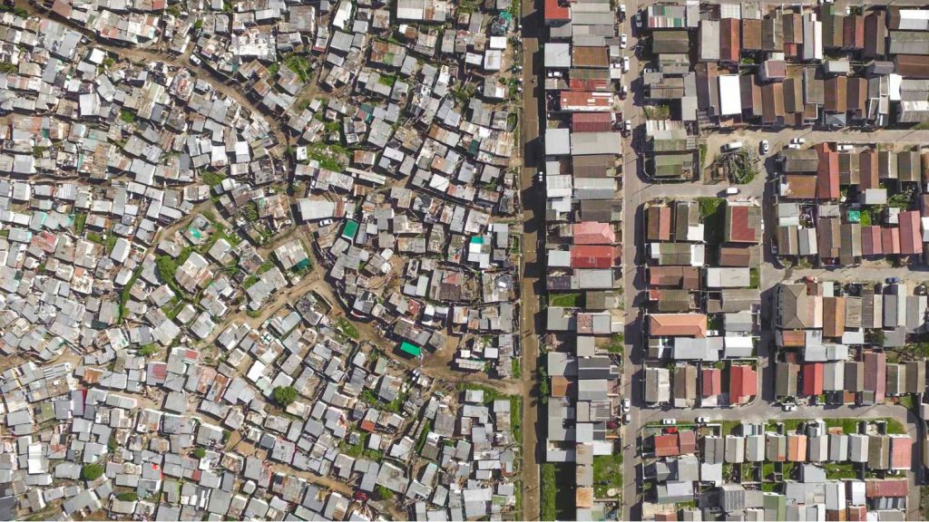 Drone photos show the massive divide between rich and poor in South ...